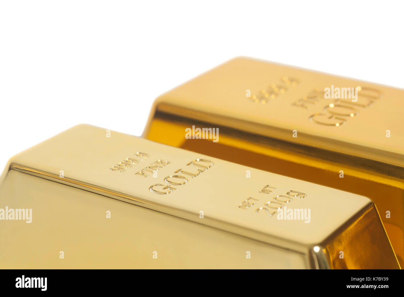 Gold bullion isolated on white background Stock Photo - Alamy