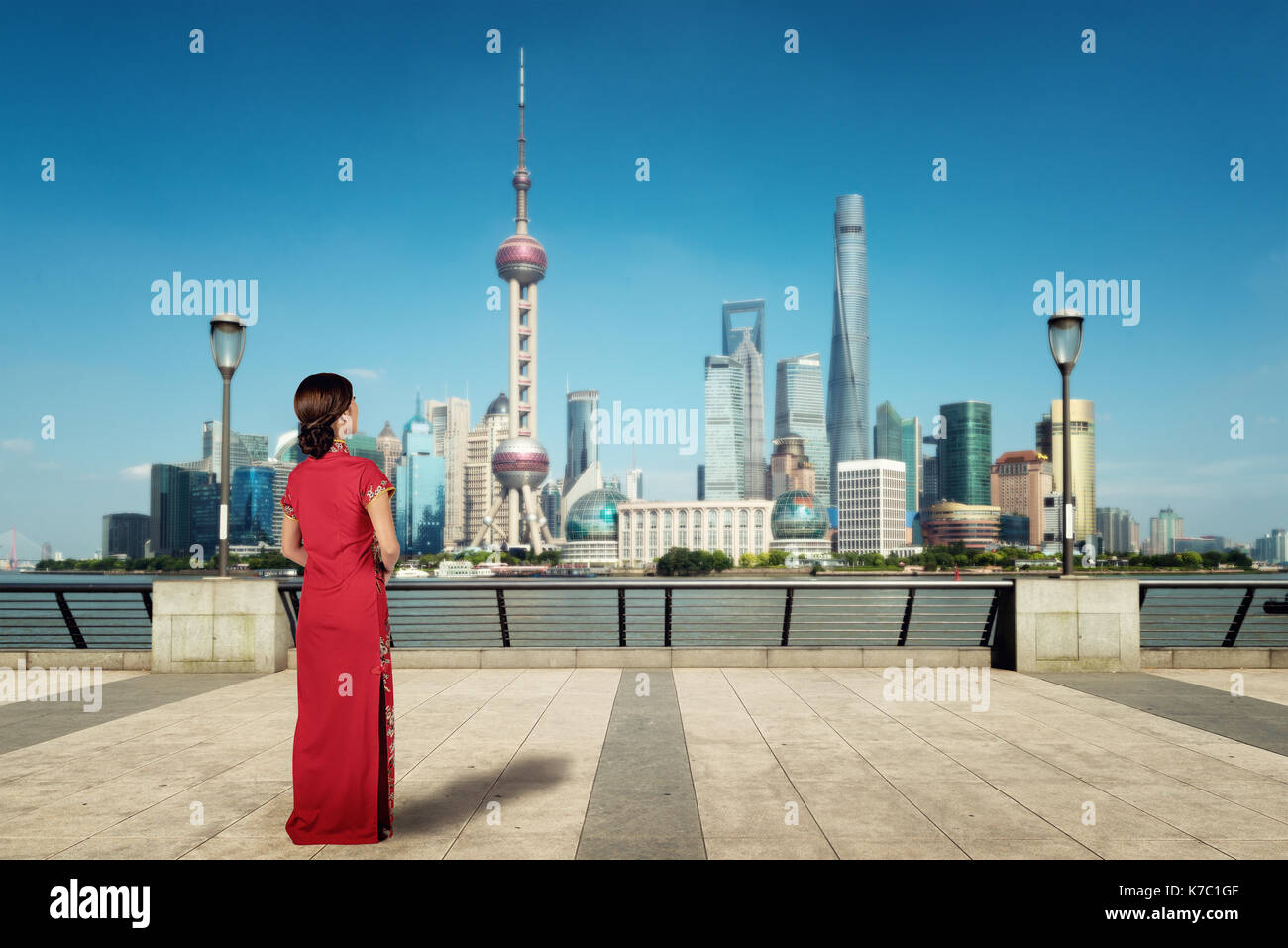 Asian young woman in Chinese traditional dress travel in Shanghai ...