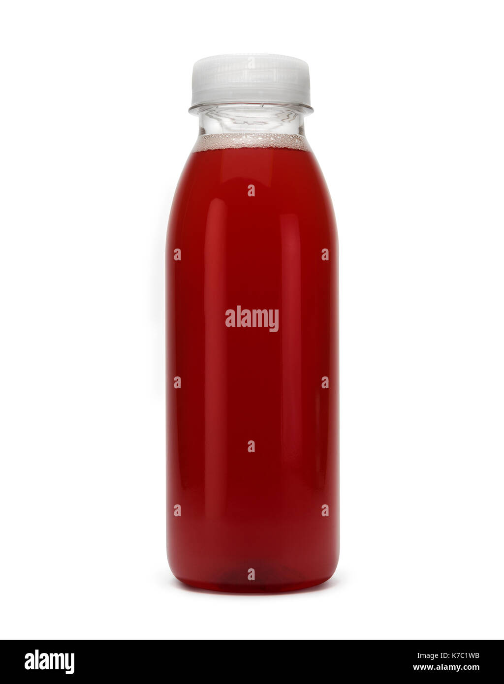 Small plastic bottle filled with red liquid isolated on white ...