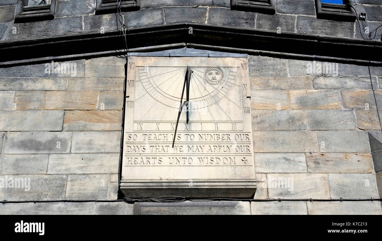 sundial above church door Stock Photo - Alamy