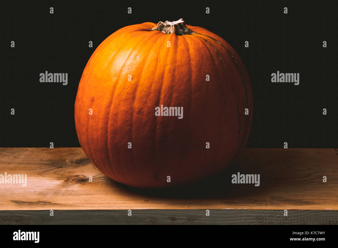 Pumpkin still life in a dark baroque style Stock Photo - Alamy