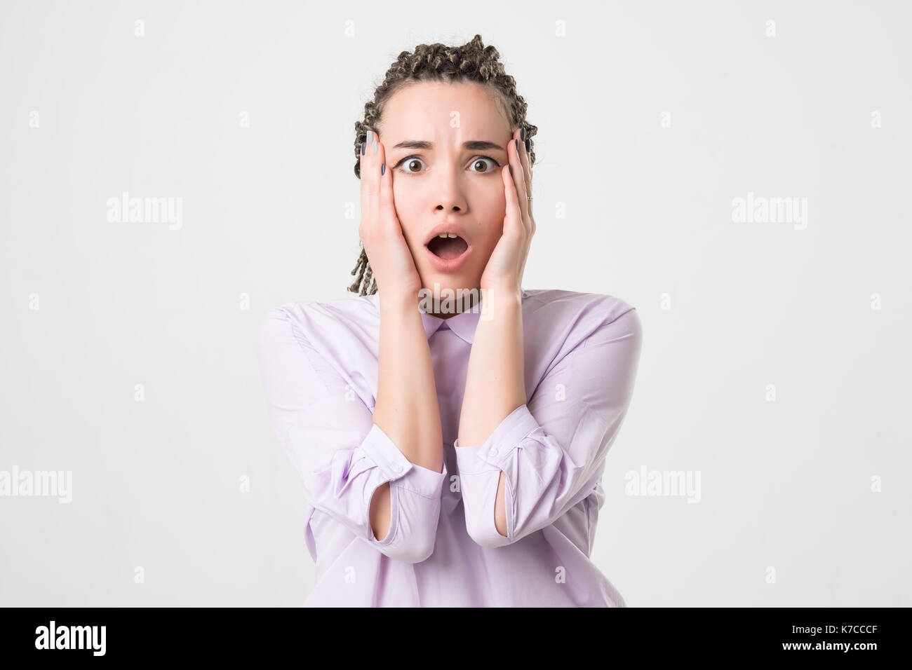 Horrified woman hi-res stock photography and images - Alamy