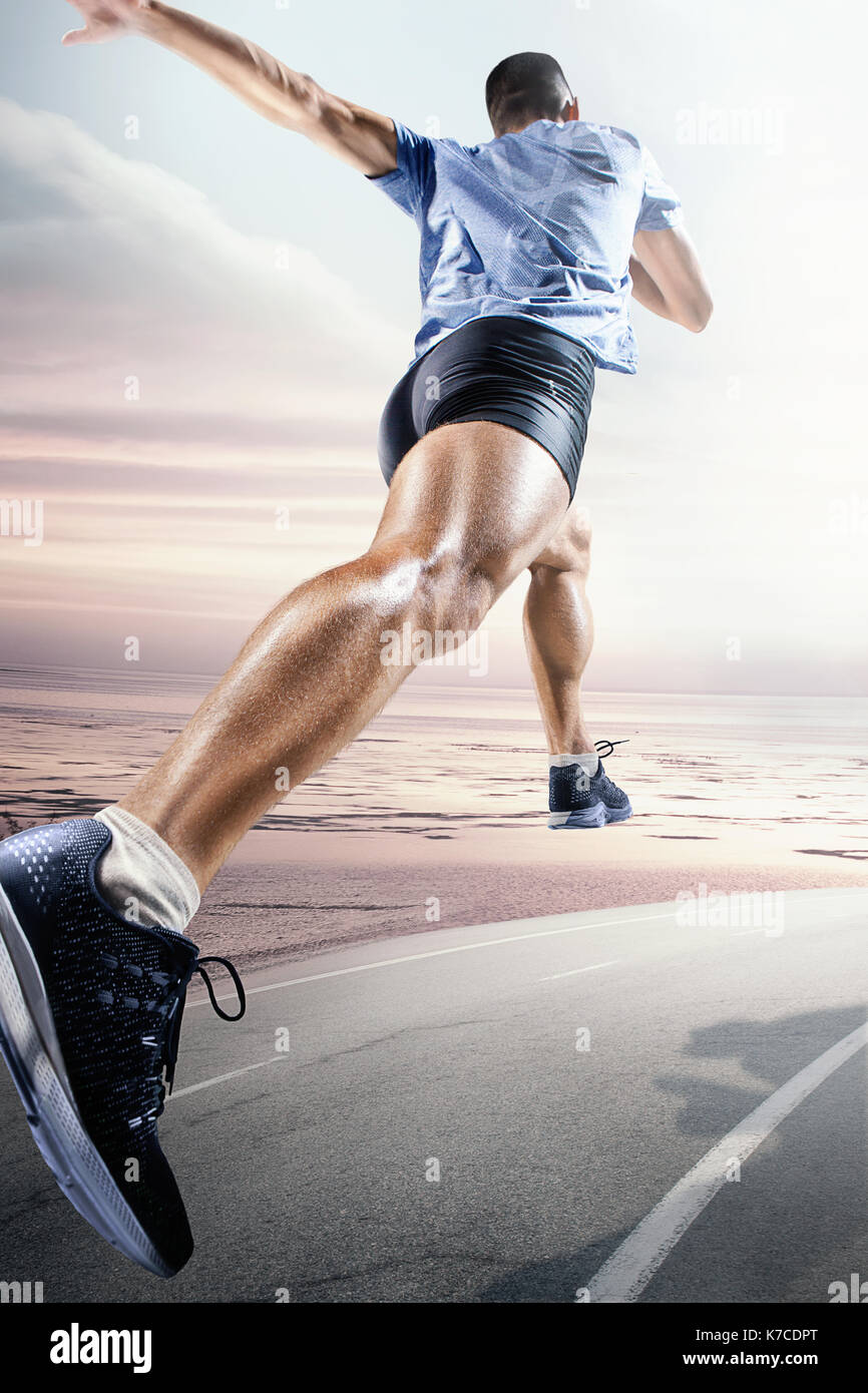 Sport backgrounds. Sprinter starting on the running track Stock Photo ...