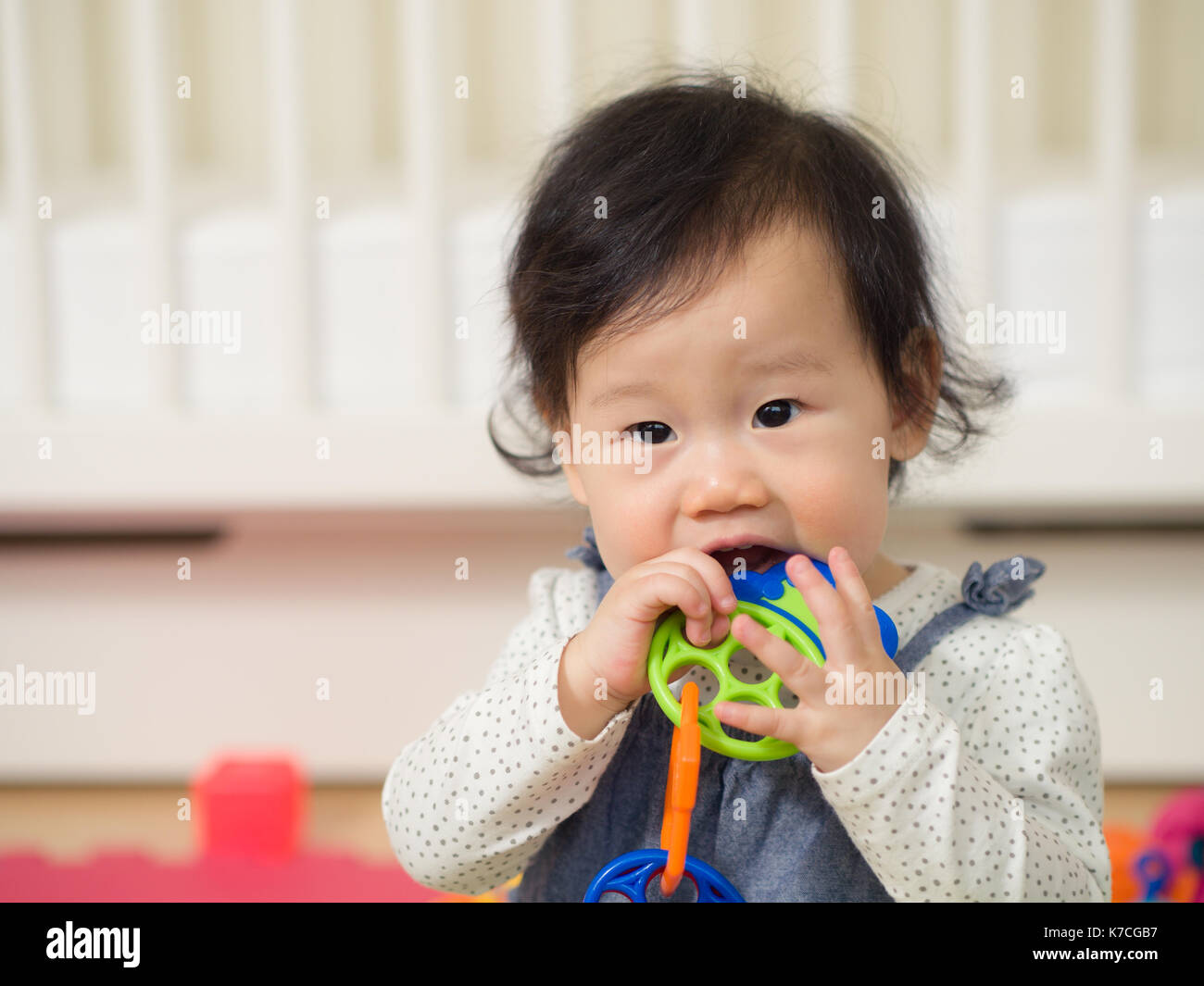 teething baby girl Stock Photo - Alamy