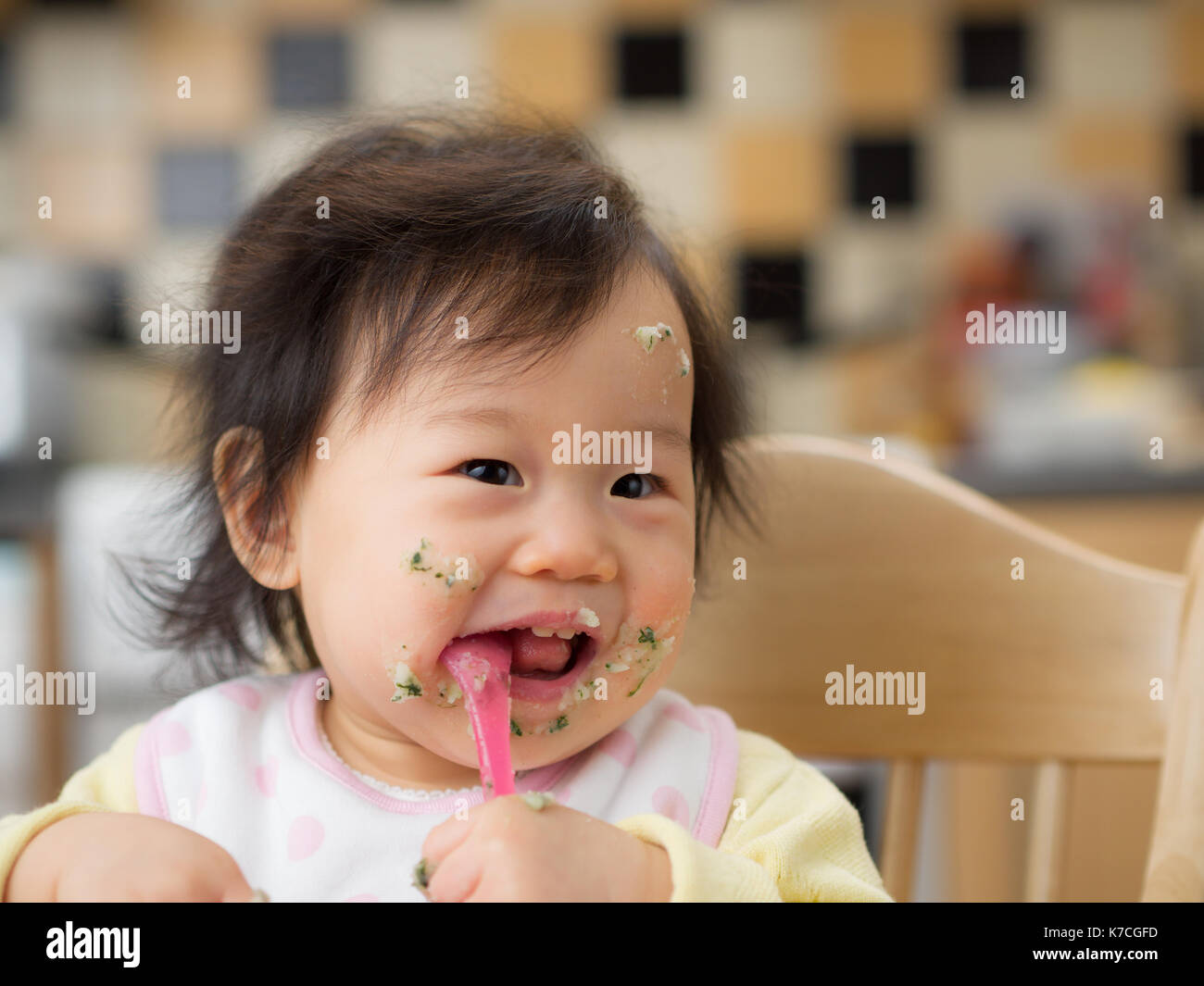 baby eating messy mashed potato Stock Photo - Alamy