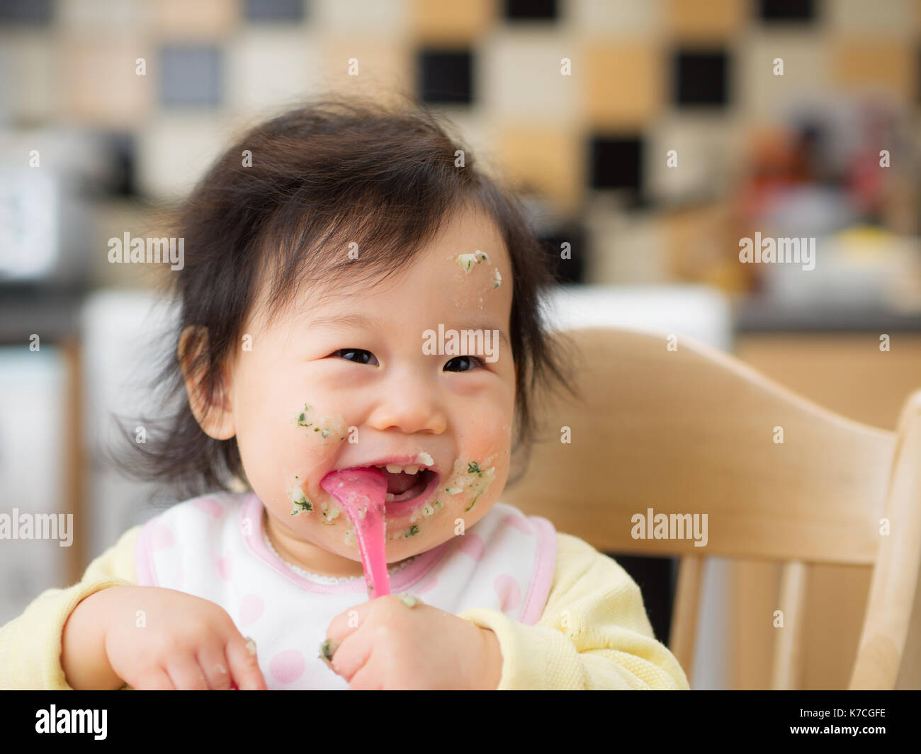baby eating messy mashed potato Stock Photo - Alamy