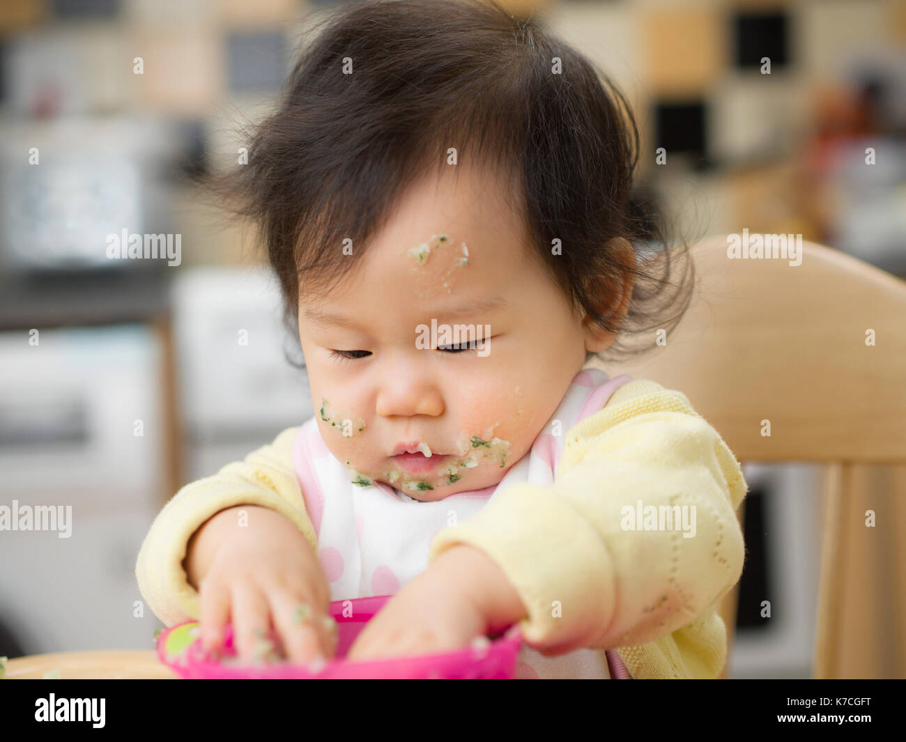 baby eating messy mashed potato Stock Photo - Alamy