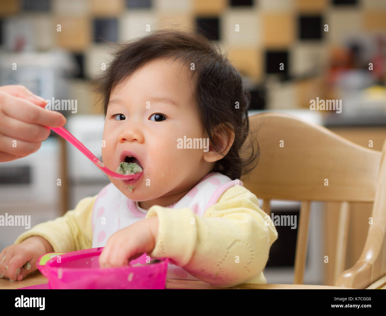 baby eating messy mashed potato Stock Photo - Alamy