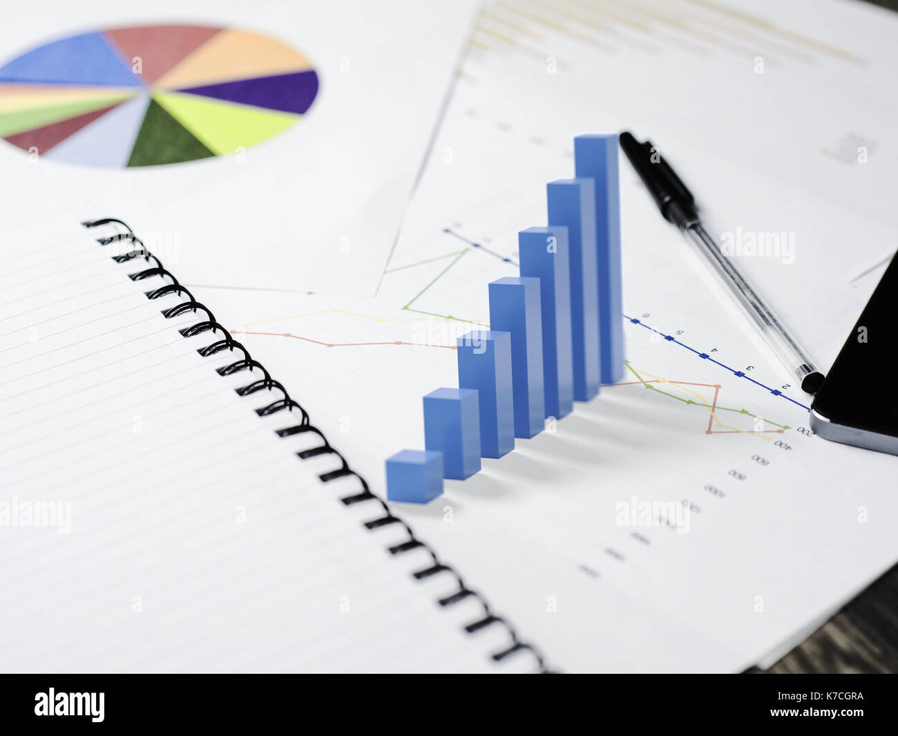 growing bar graph on table Stock Photo - Alamy