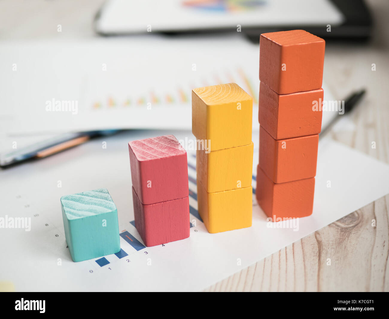 increasing bar graph made by building blocks Stock Photo - Alamy