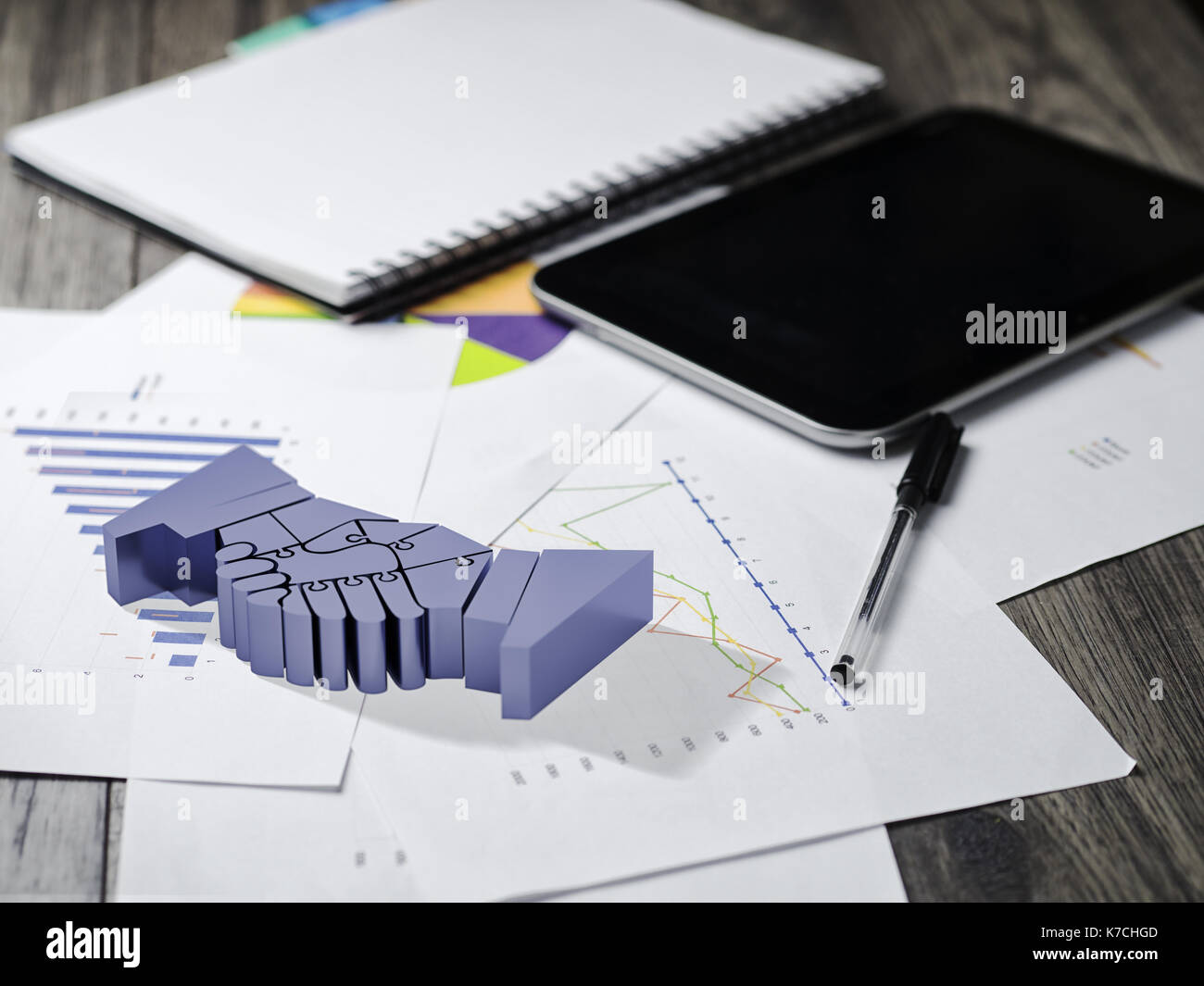 hand shake blocks sign on desk Stock Photo - Alamy