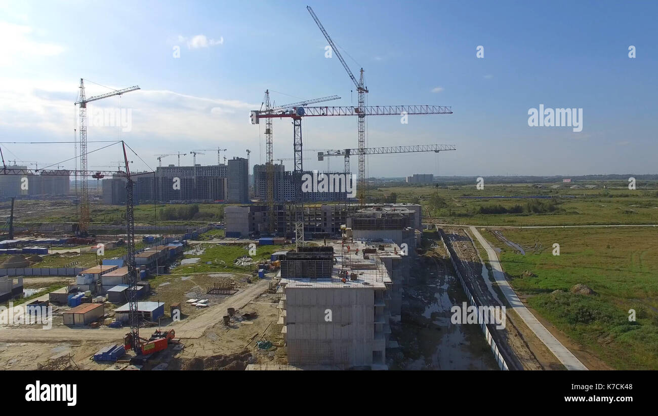 Aerial view on construction building. Construction site workers, aerial ...