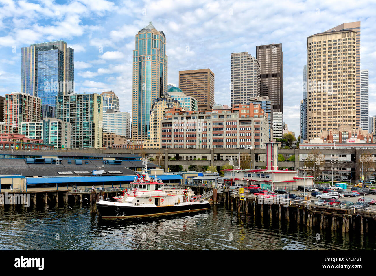 Seattle waterfront and skyline. Fire boat in the foreground. Viewed ...