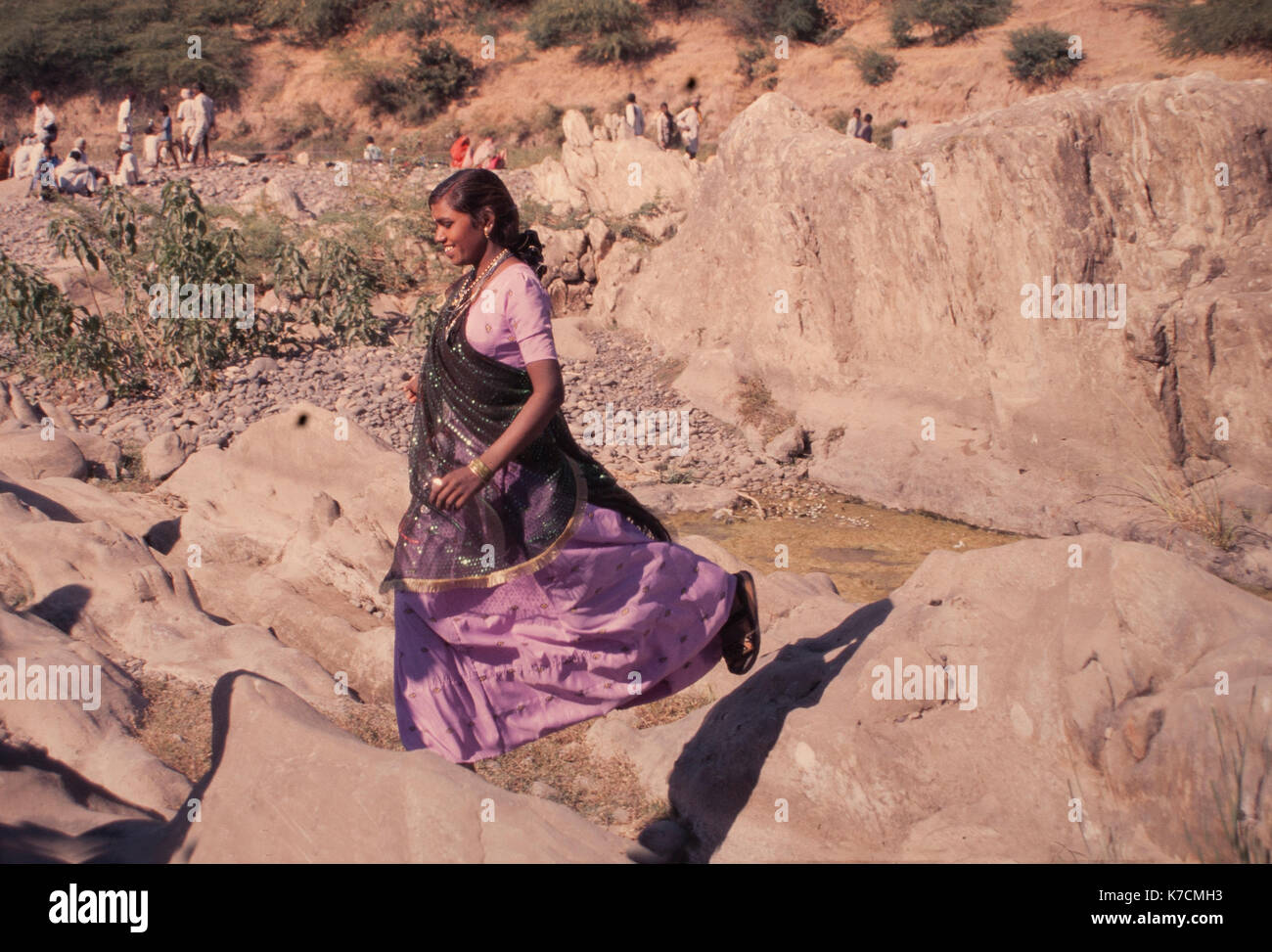 Indian woman running sari hi-res stock photography and images - Alamy