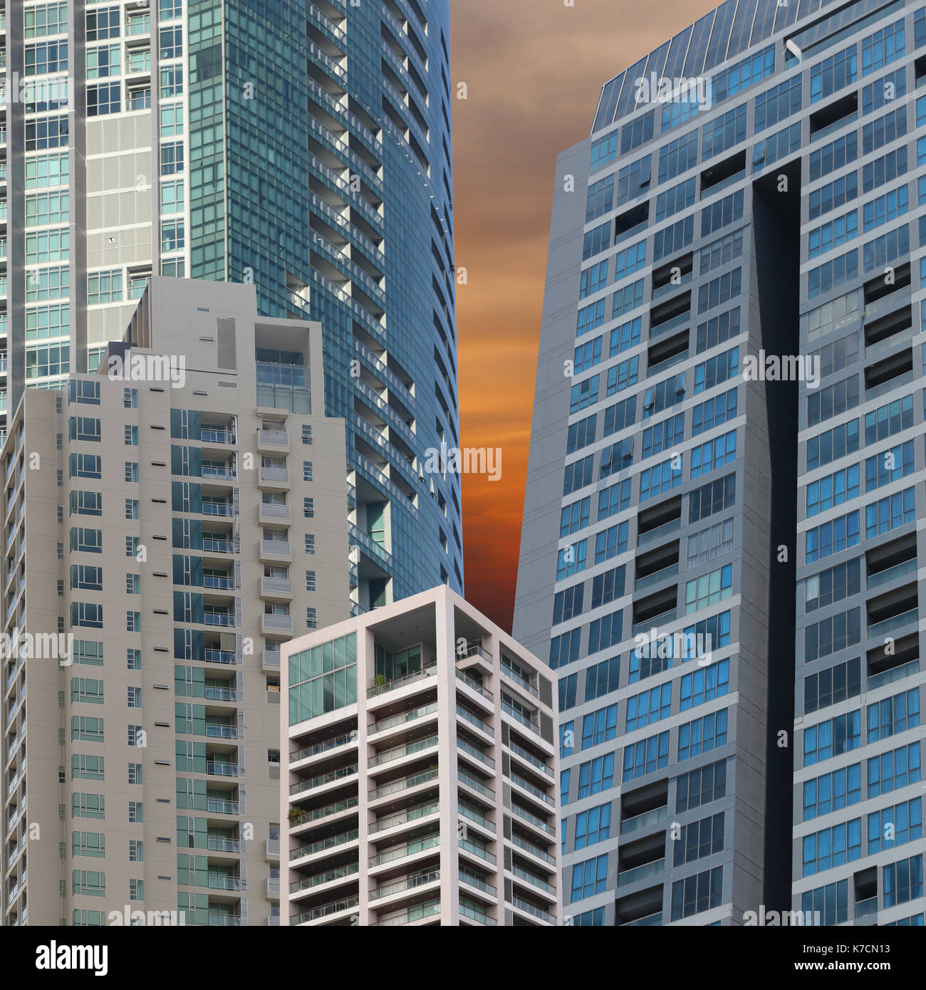 Skyscraper or Tall buildings in downtown on evening sky for design your ...