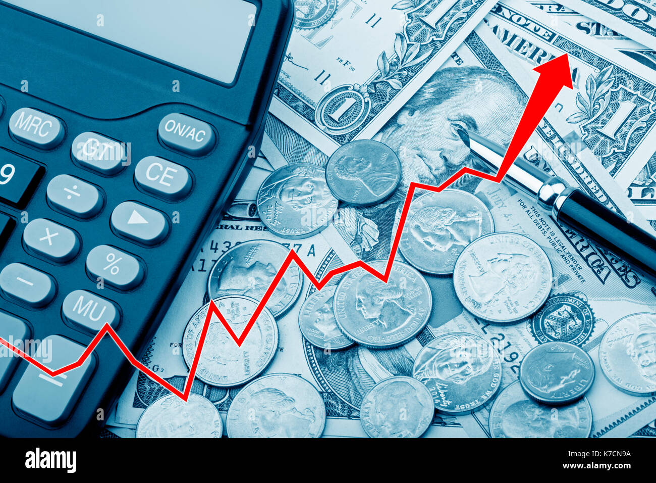 Graph showing United States bank notes and coins with a calculator and ...