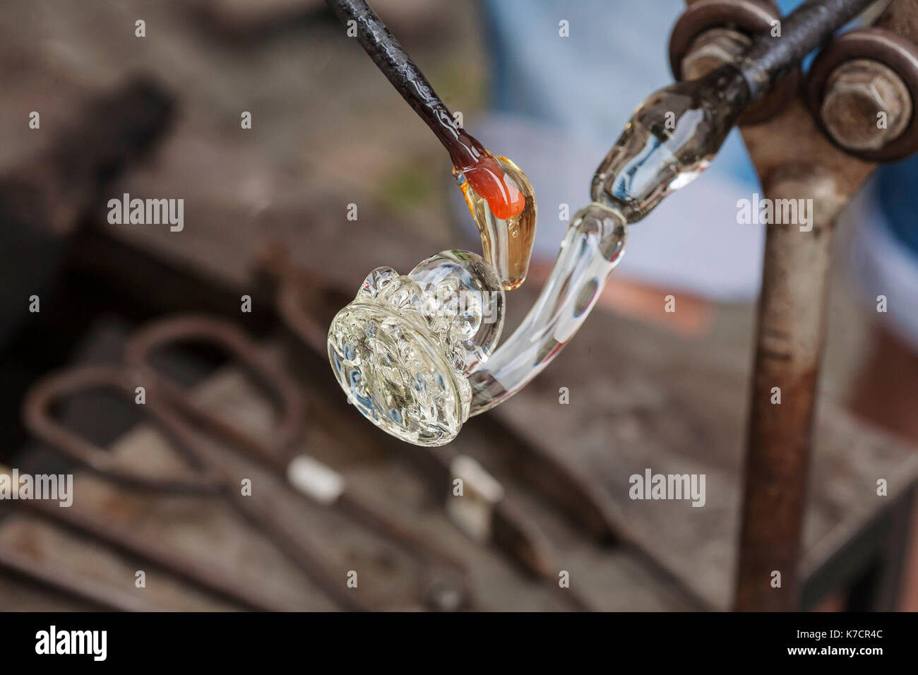 Glass artist making new piece of glass art in the furnace Stock Photo ...