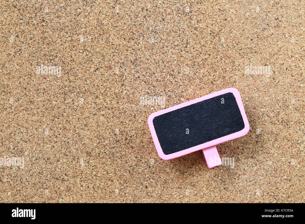 Pink empty wood sign on wooden cork background for input text in your ...