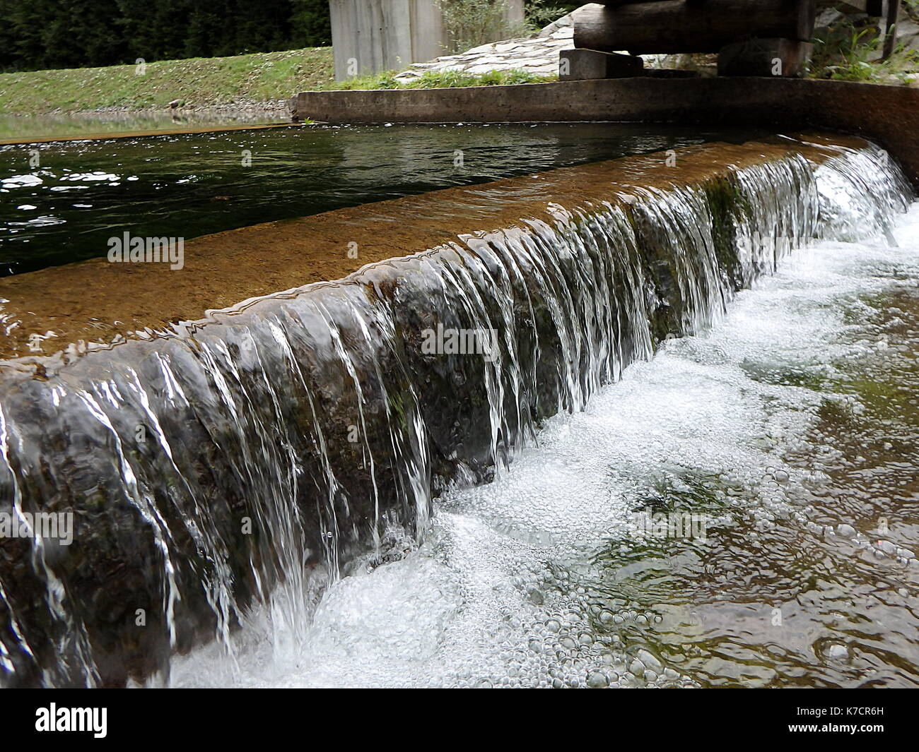 small waterfall, artificial cascade on the river Stock Photo - Alamy