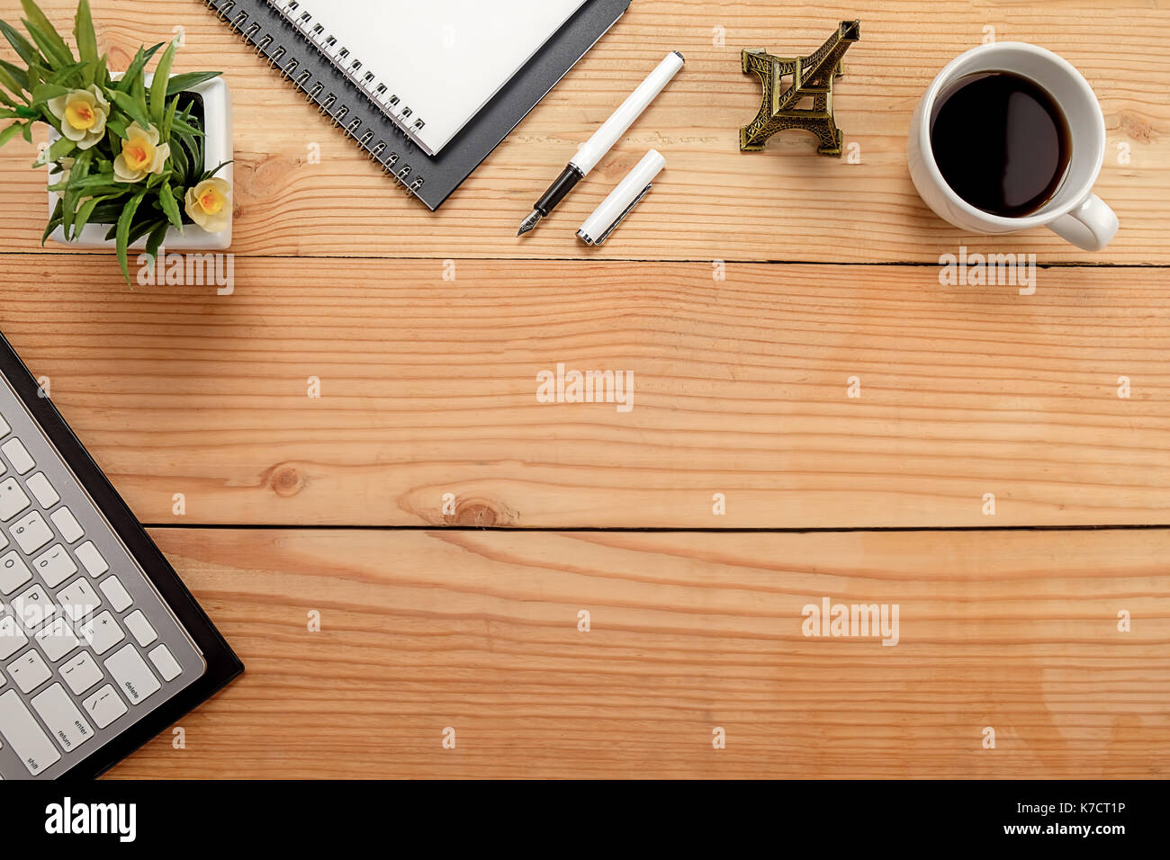 Office desk table with chart calculator notebook pen glasses and flower ...