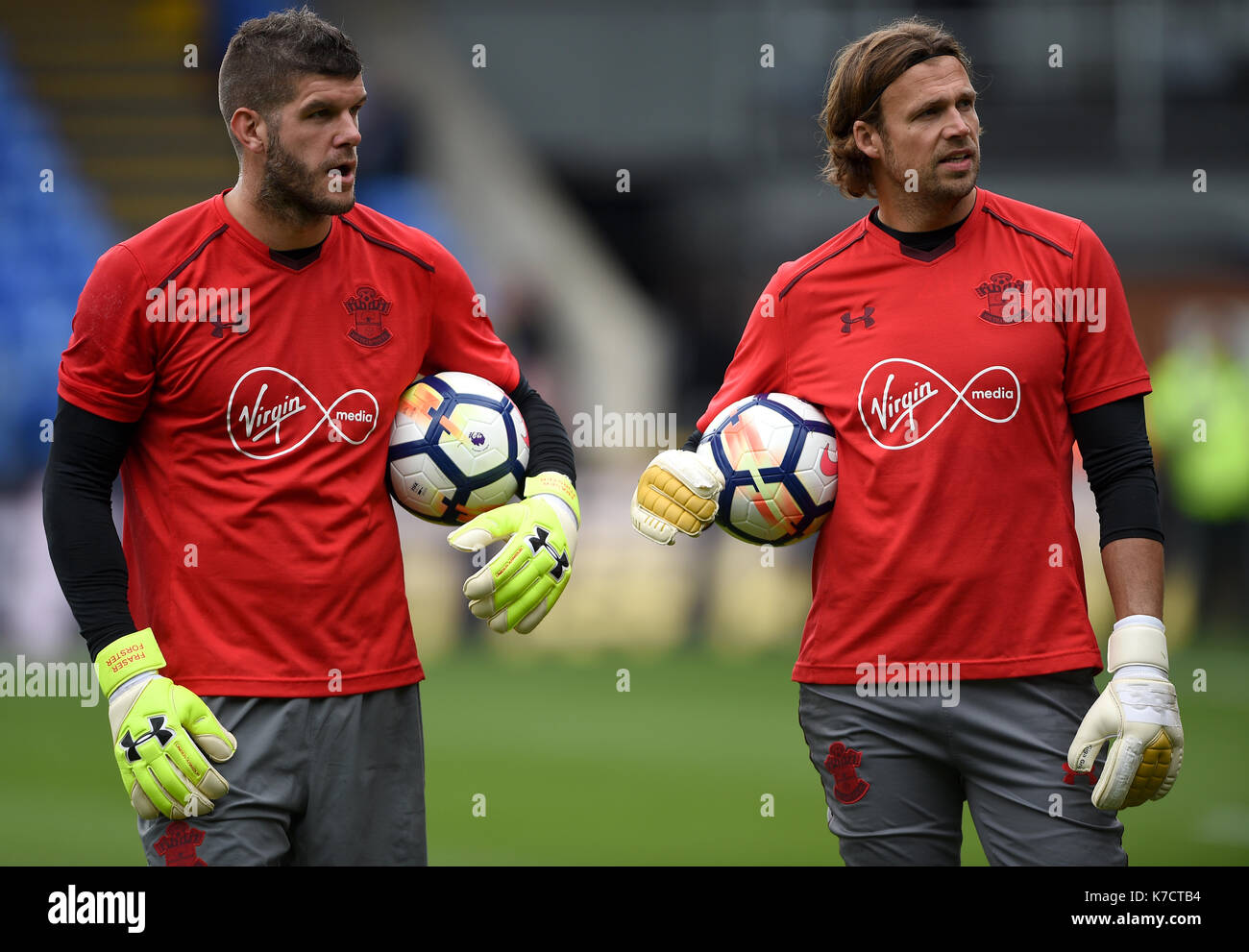 Southampton goalkeeper Fraser Forster (left) and Stuart Taylor warms up ...