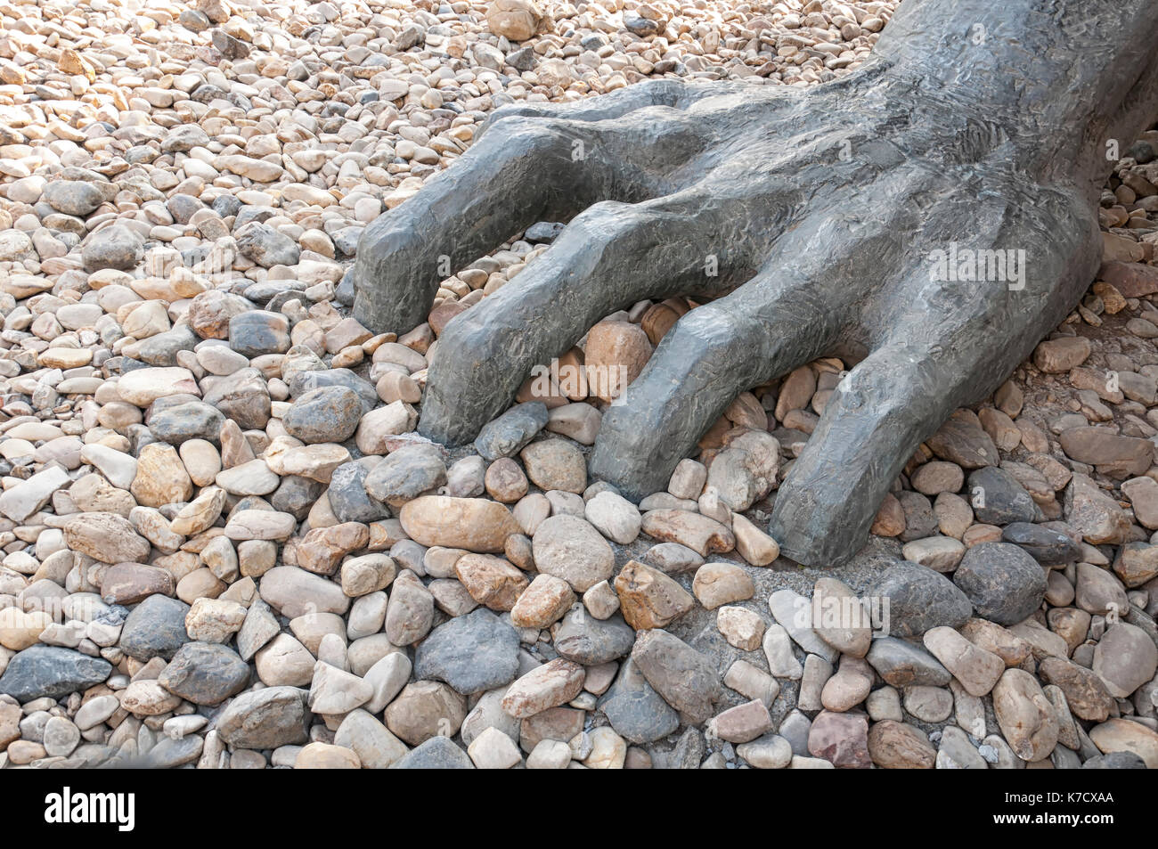 A stone hand grasping at the ground within the Nanjing massacre site ...
