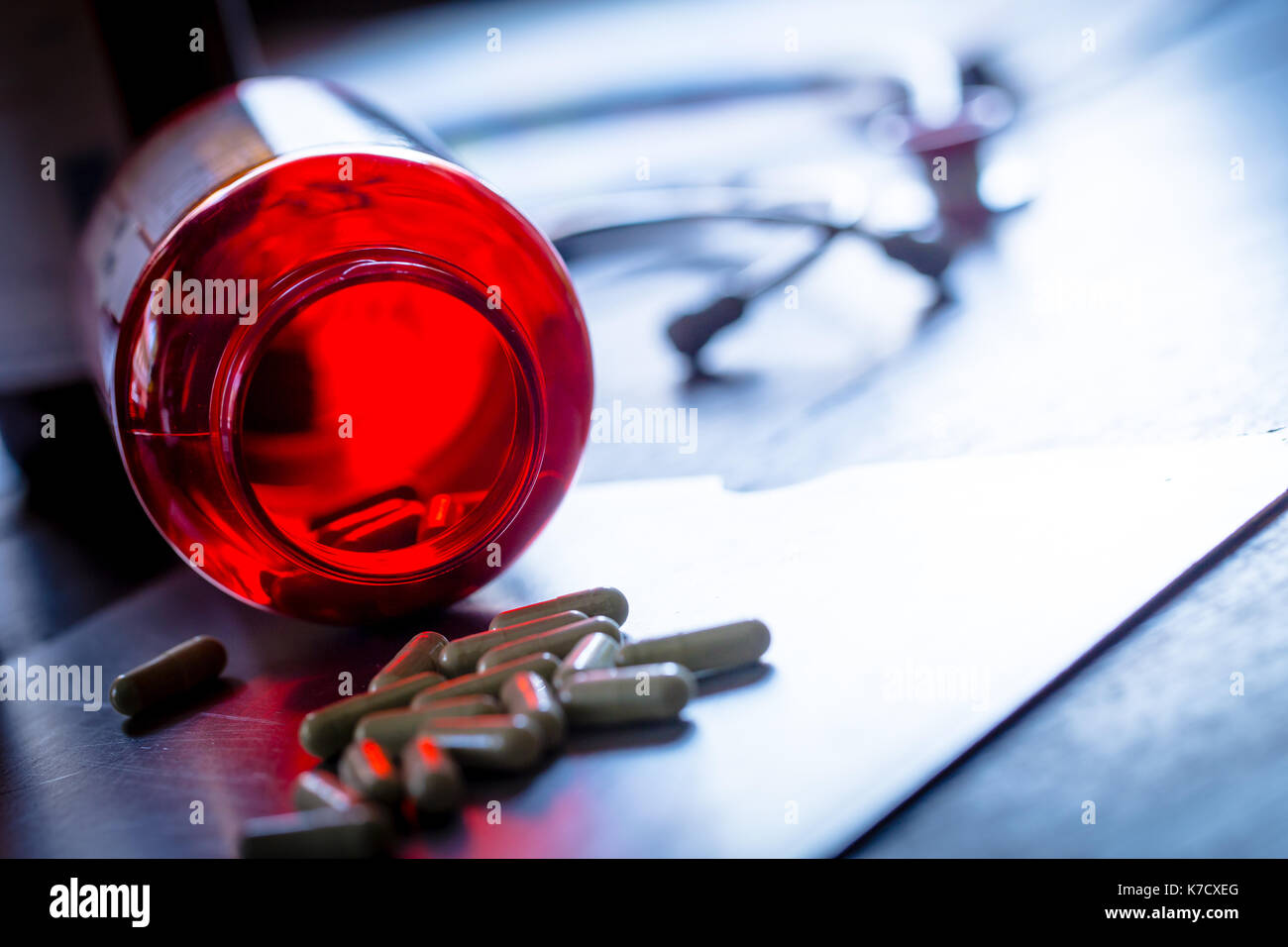 Medical Medicine pill capsule drop treatment concept in danger dark ...