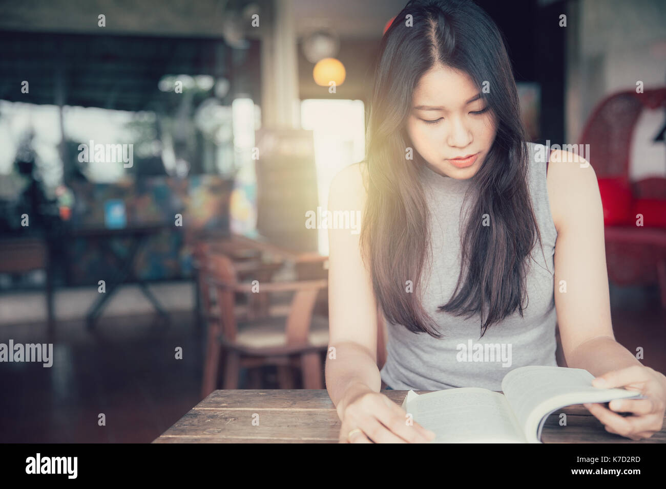 Enjoy relax times with reading book, Asian women Thai teen smile with ...