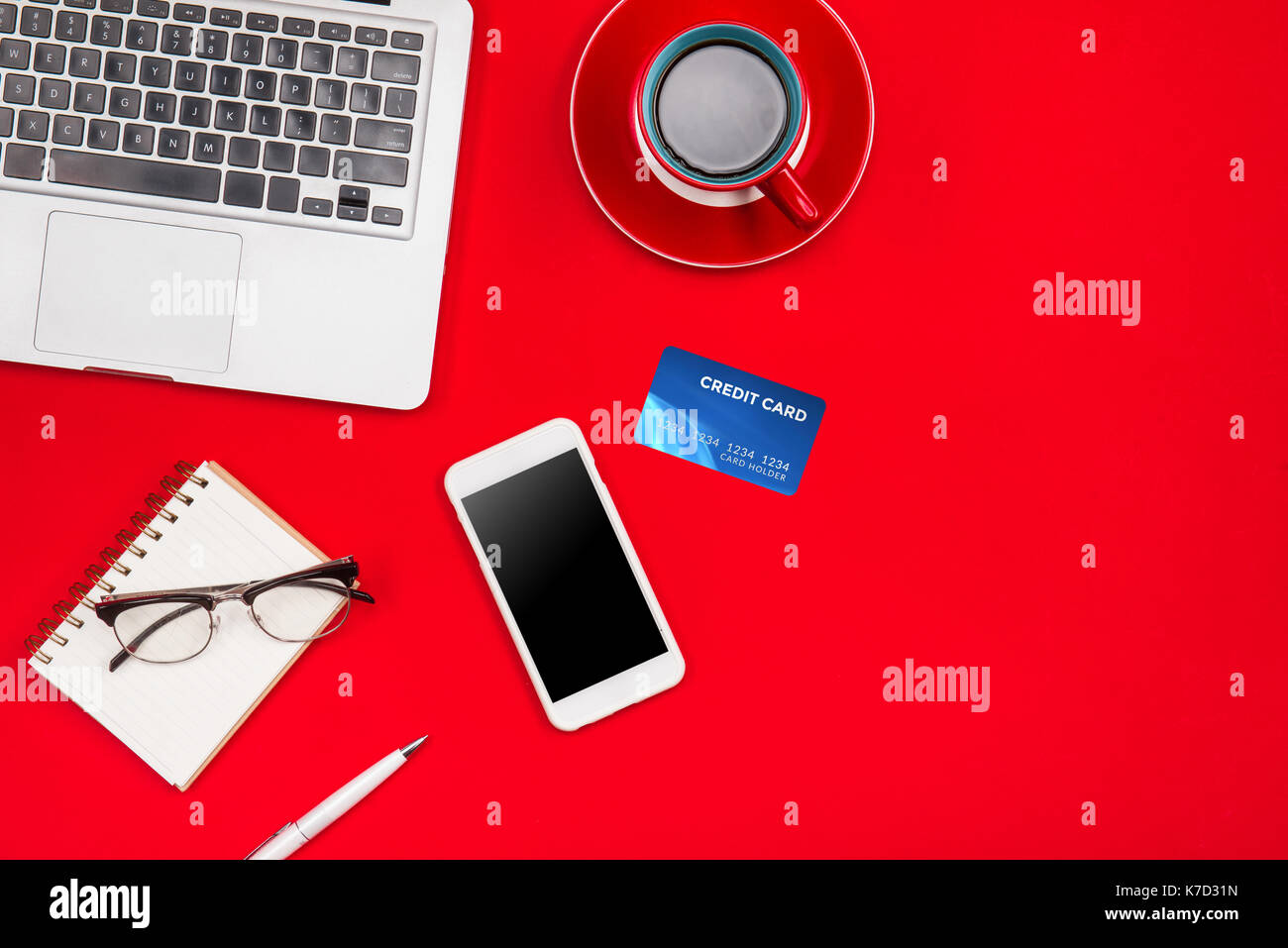 Laptop, cup of coffee, credit card and smart phone .Top view with copy ...