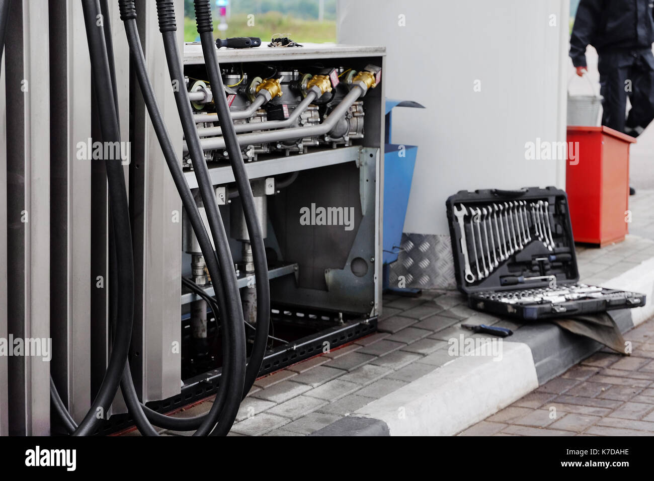 Petrol pump repair and mechanic walking in the blurred background Stock ...
