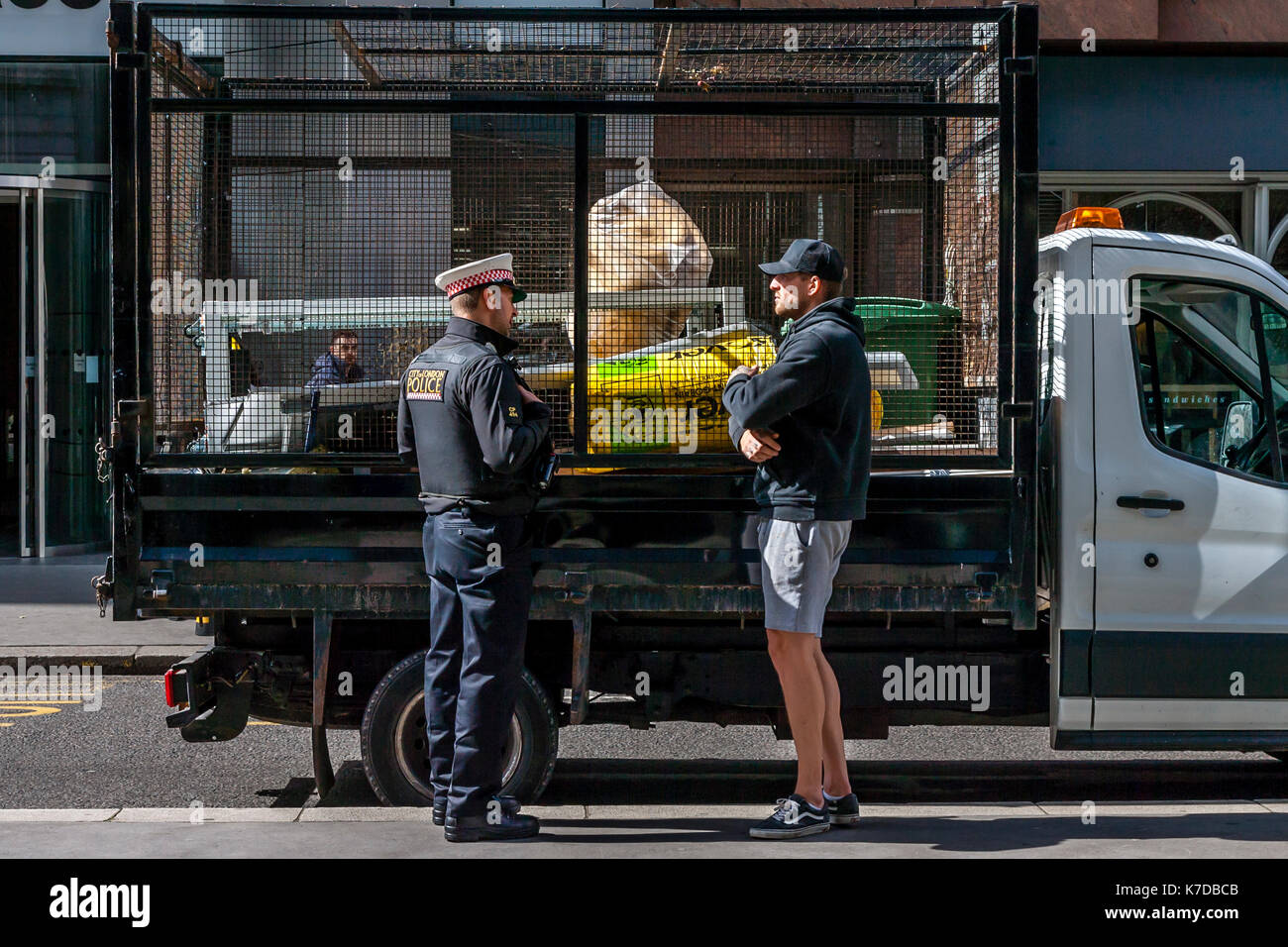 A City Of London Police Officer Monitoring Traffic In The City Of ...