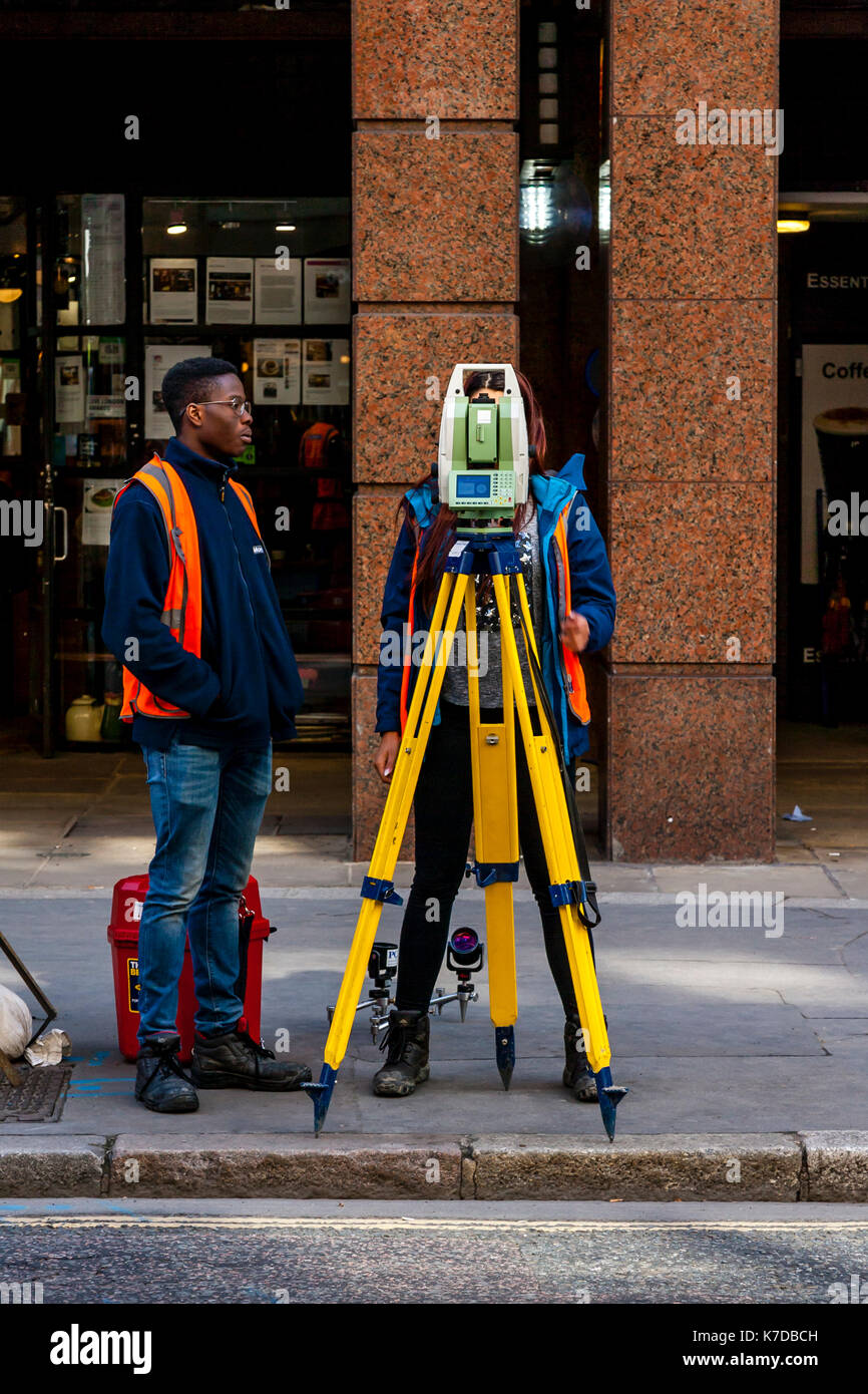 Surveyors Working In A London Street, The City Of London, London, UK ...