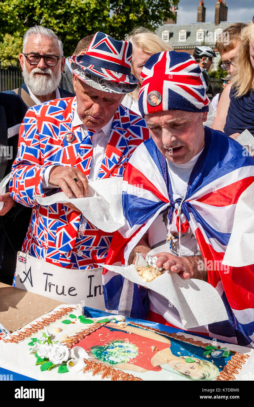 Supporters Of The Late Princess Diana Cutting A Large Cake In Memory Of ...