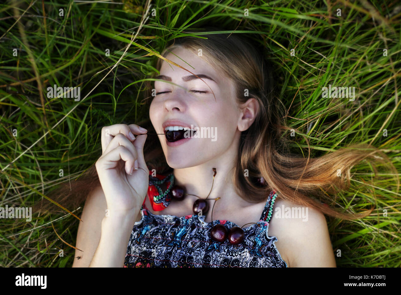 Close up woman eating cherry hi-res stock photography and images - Alamy