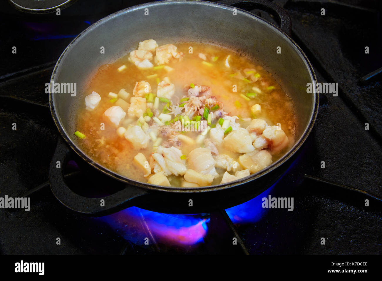 Little octopus rice with spinach and squash recipe Stock Photo - Alamy