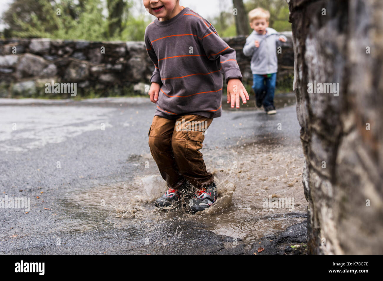 Puddle jumping hi-res stock photography and images - Alamy