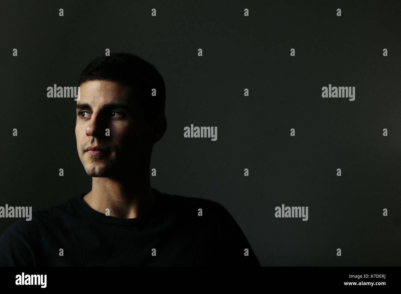 Man looking at wall hi-res stock photography and images - Alamy