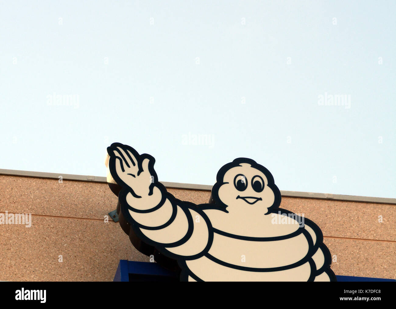 Bibendum man at the front of Michelin headquarters building, Clermont ...