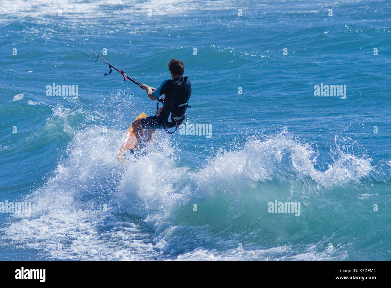 Surfer kitesurfing jumping air hi-res stock photography and images - Alamy