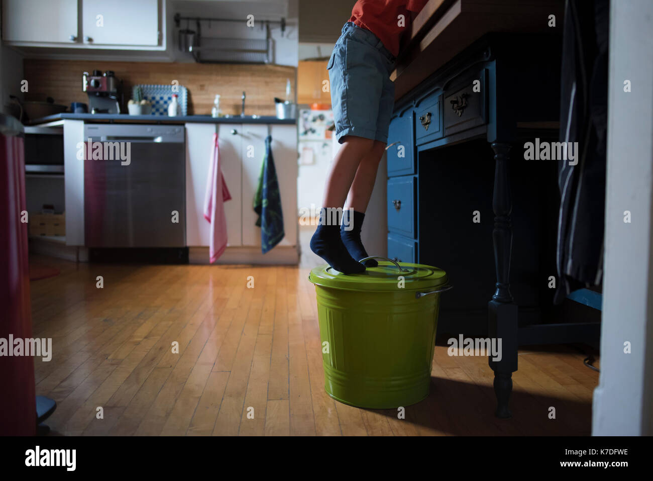 Boy standing on tiptoes hi-res stock photography and images - Alamy