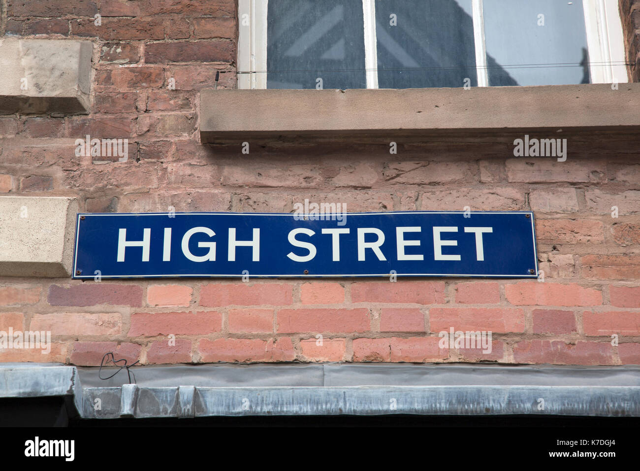 High Street Sign on Brick Wall Facade; England; UK Stock Photo - Alamy
