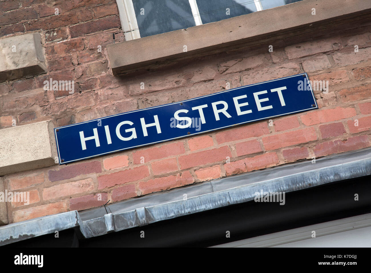 High Street Sign on Brick Wall Facade; England; UK Stock Photo - Alamy