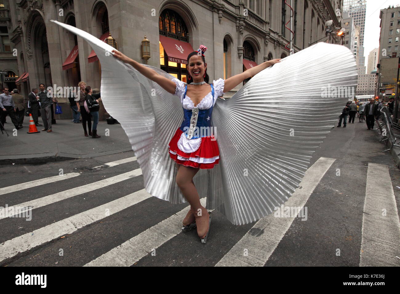 An Occupy Wall Street protestor shows her performance skills along the ...
