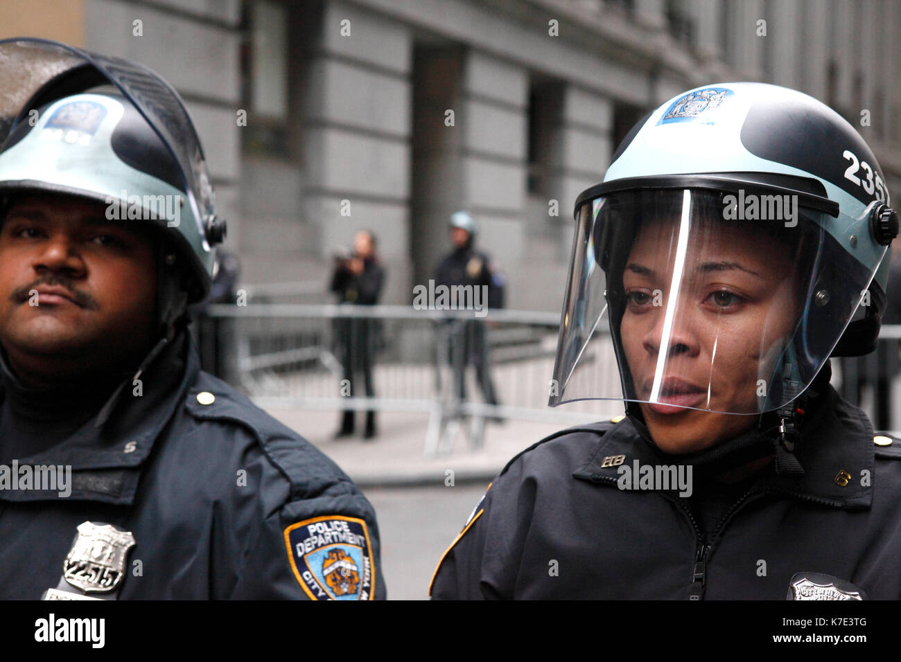 NYPD officers form a barricade to block Occupy Wall Street protestors ...