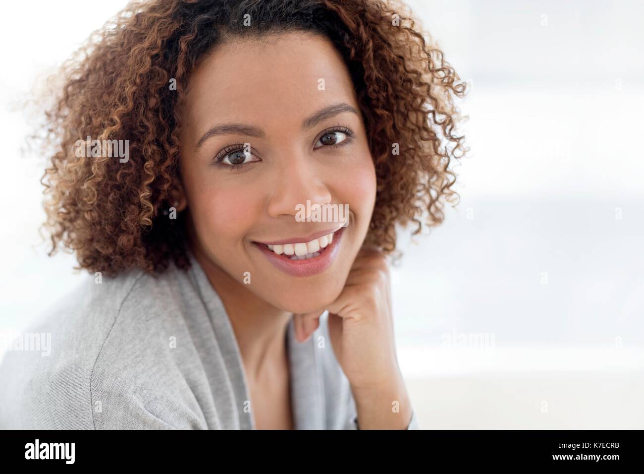 Portrait of mid adult woman smiling Stock Photo - Alamy
