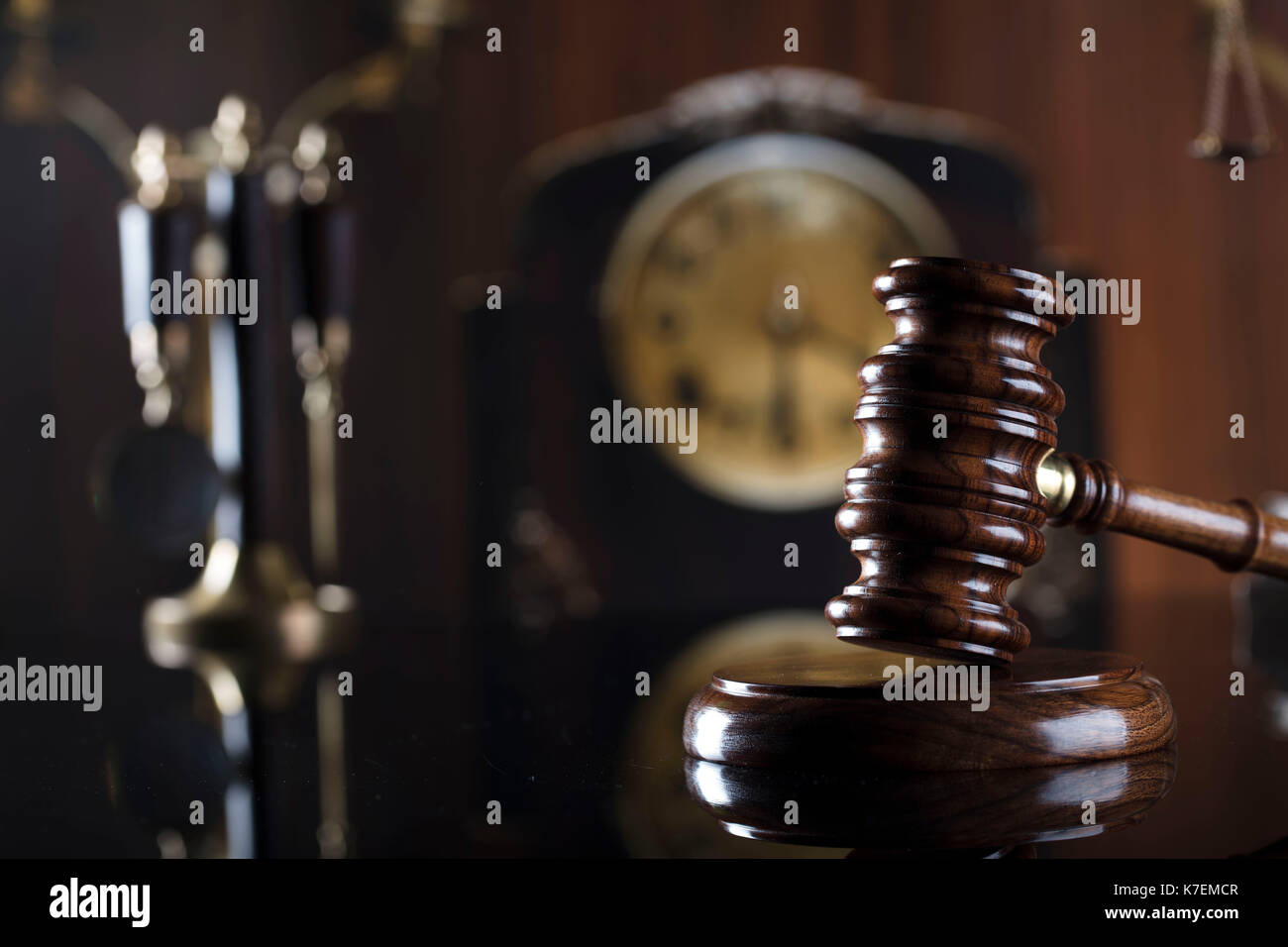 Old library. Vintage clock. Statue of justice and gavel. Law concept ...