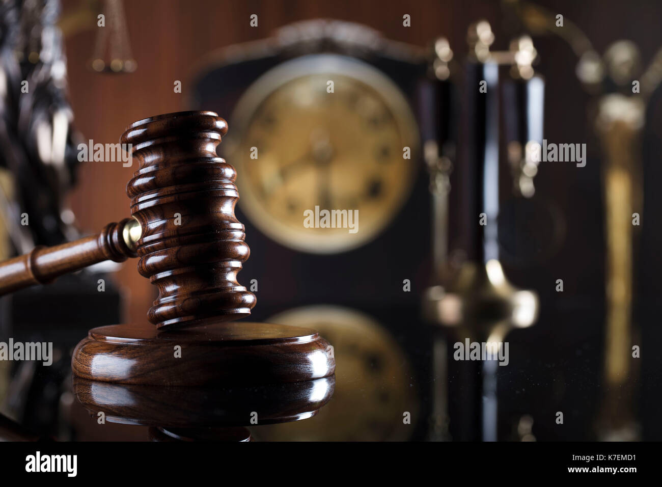Old library. Vintage clock. Statue of justice and gavel. Law concept ...