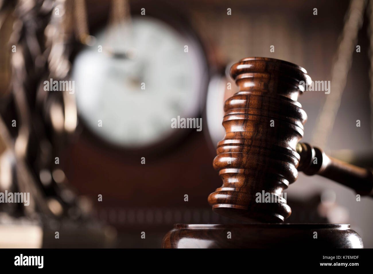 Old library. Vintage clock. Statue of justice and gavel. Law concept ...