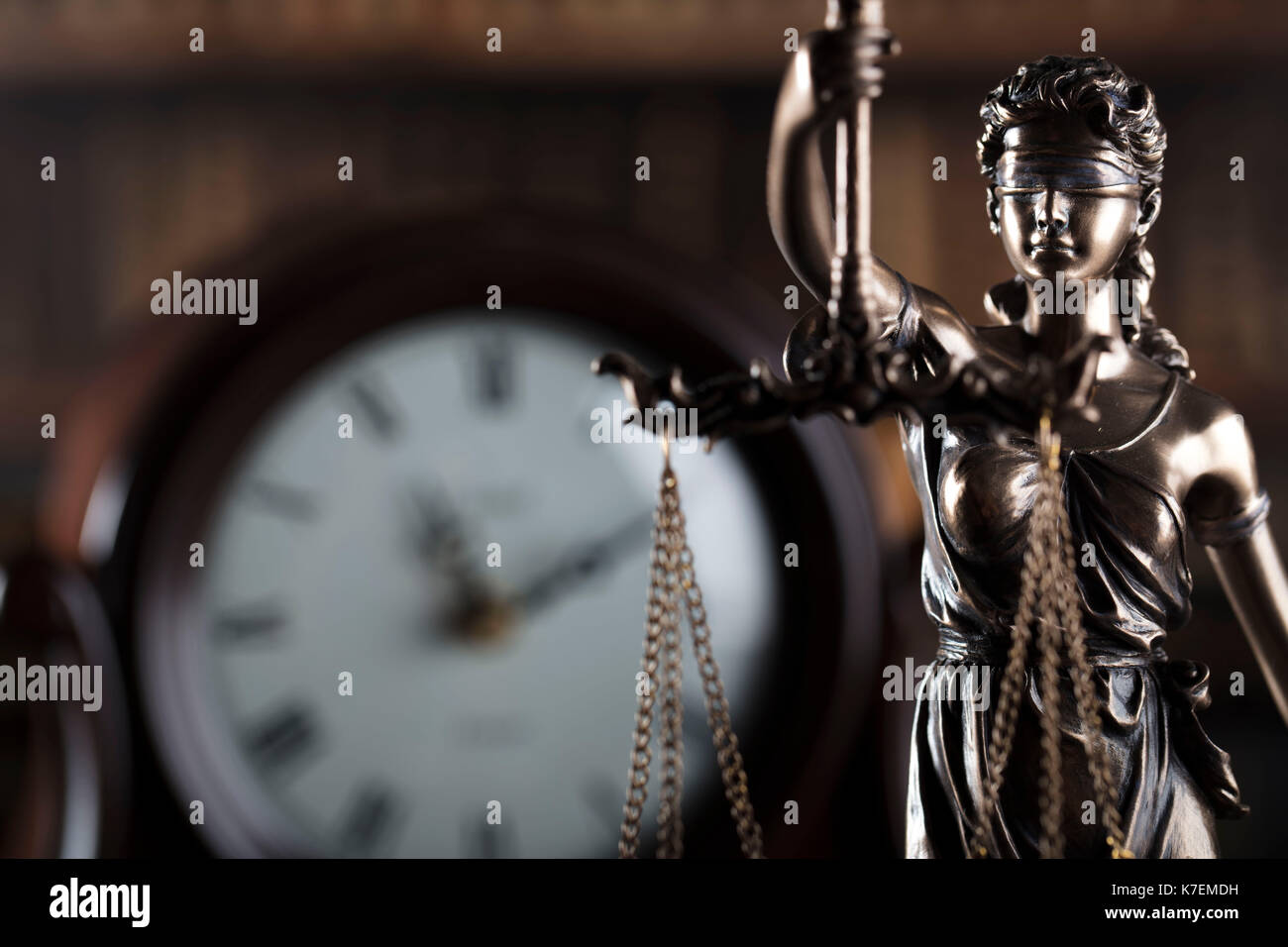 Old library. Vintage clock. Statue of justice and gavel. Law concept ...