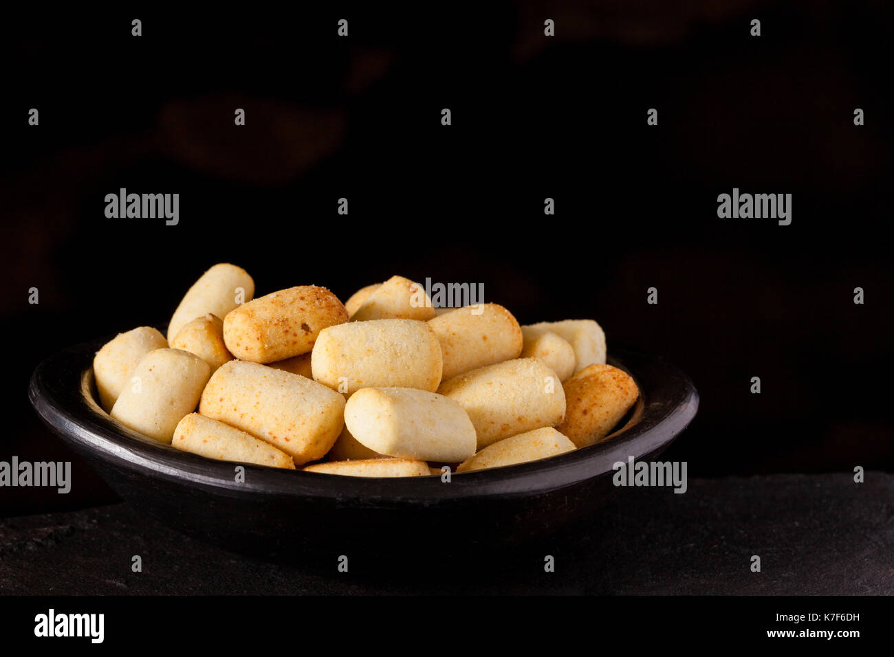 Traditional snack from Colombia called achira on black background Stock ...